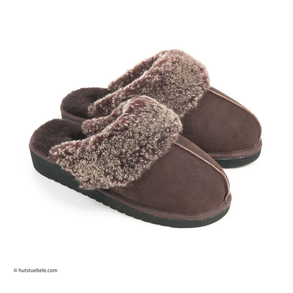 Pantofole da donna in pelliccia di montone con orlo largo e suola zeppa